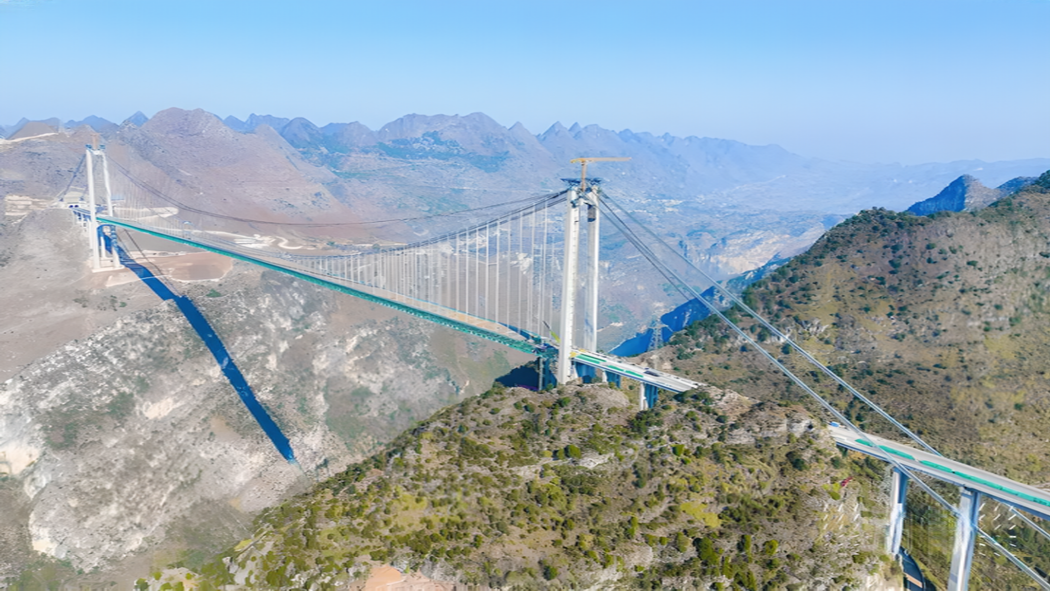Huajiang Canyon Bridge（A steel truss girder suspension bridge spanning ...
